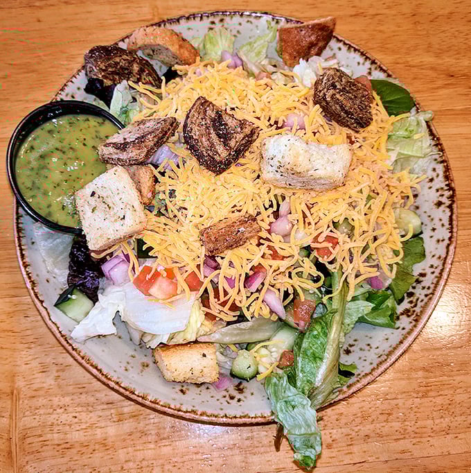 A salad that doesn't feel like punishment. Fresh greens, vibrant vegetables, and perfectly toasted croutons prove healthy eating can still be a celebration.