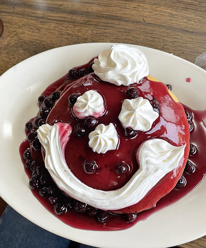 This isn't just a pancake&mdash;it's a berry-topped masterpiece with whipped cream islands. Breakfast that doubles as modern art, but tastes infinitely better.