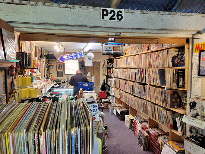 Vinyl enthusiasts can lose hours in this record shop, where forgotten B-sides and rare pressings promise musical treasure hunts.