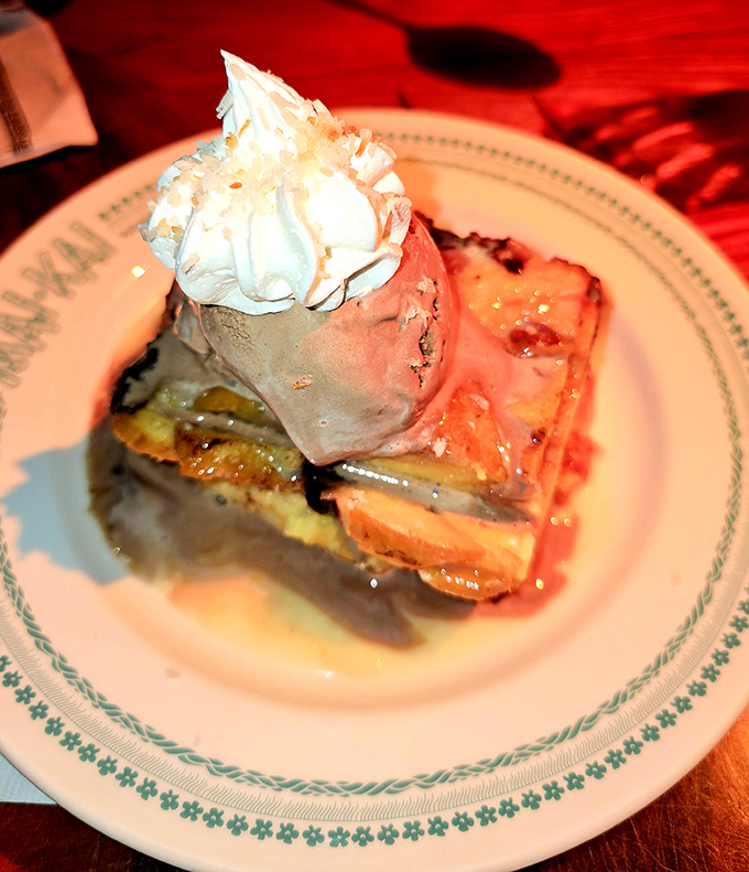 Bread pudding topped with ice cream&mdash;where warm, caramelized comfort meets cool, creamy indulgence in dessert paradise.