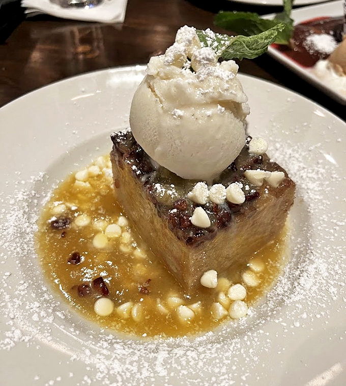 Bread pudding that would make your grandmother jealous. This caramel-drenched square of heaven with its melting ice cream crown proves dessert is never just an afterthought here.
