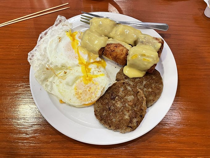 Breakfast on a stick never looked so good, with those perfectly poached eggs draped over sausage in hollandaise heaven.