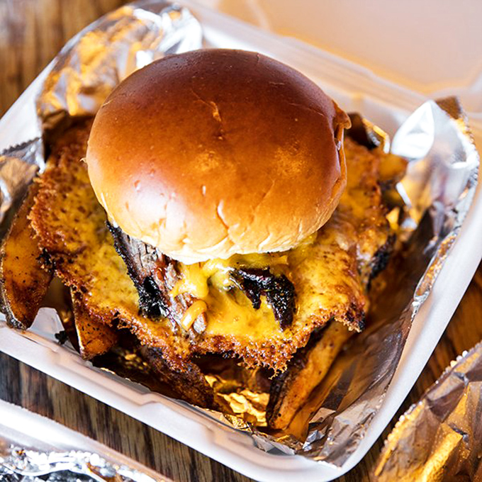 A burger that's having an identity crisis in the best possible way. When brisket meets cheese, magic happens on a brioche stage.