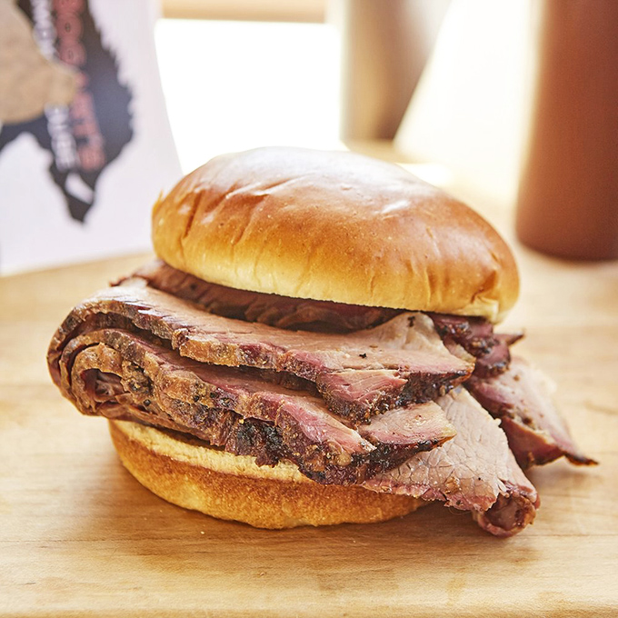 Brisket that doesn't need words&mdash;just appreciative silence. Those perfectly sliced ribbons of beef tell a story of patience, smoke, and barbecue mastery.