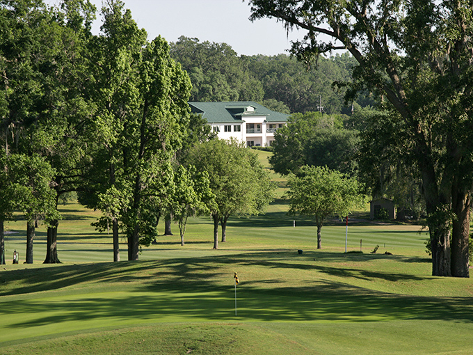 Lush fairways wind through mature trees at Brooksville Country Club. Golf as nature intended it – challenging, beautiful, and mercifully free of alligators.