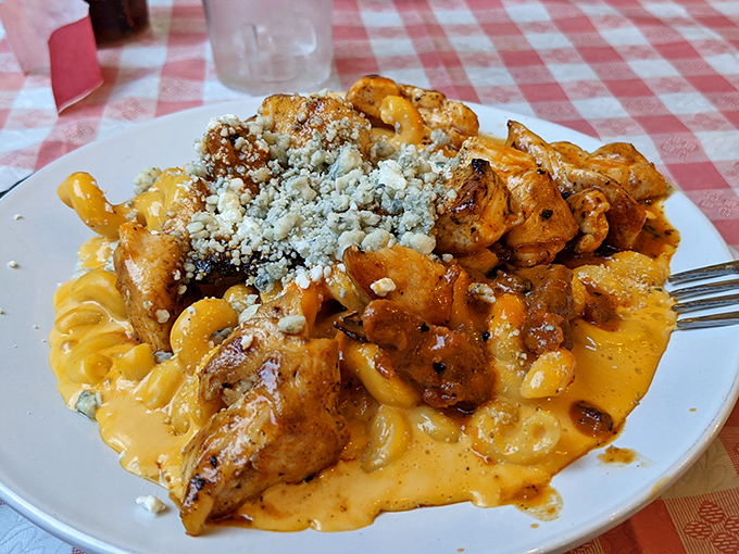 Buffalo chicken mac and cheese&mdash;where comfort food gets a spicy makeover. Blue cheese crumbles add that perfect sharp counterpoint to the creaminess.