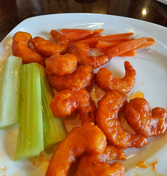 Buffalo shrimp: proof that chickens shouldn't get all the glory. These saucy little crescents of joy bring the heat with a seafood twist.