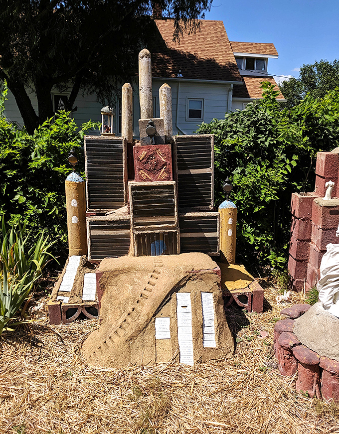 This "bug hotel" sculpture demonstrates that even insects deserve architectural excellence when visiting the Grassroots Art Capital of Kansas.