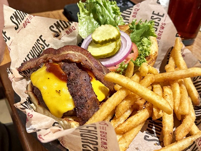 A burger that requires both hands, a stack of napkins, and possibly a post-meal nap. Worth every delicious, messy moment.