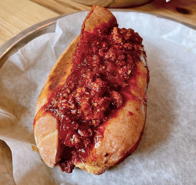 This isn't just a chili dog&mdash;it's a handheld flavor bomb that reminds you why certain foods have earned their place in the American culinary hall of fame.