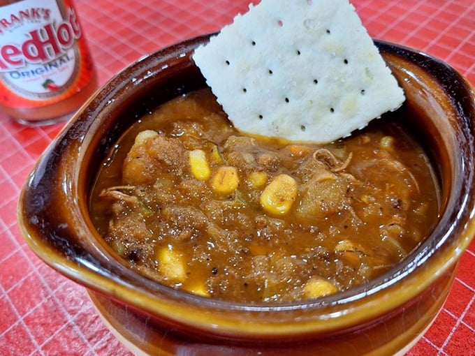 Burgoo - Kentucky's legendary stew that's like a family reunion where all the ingredients actually get along, served with a saltine for dipping.