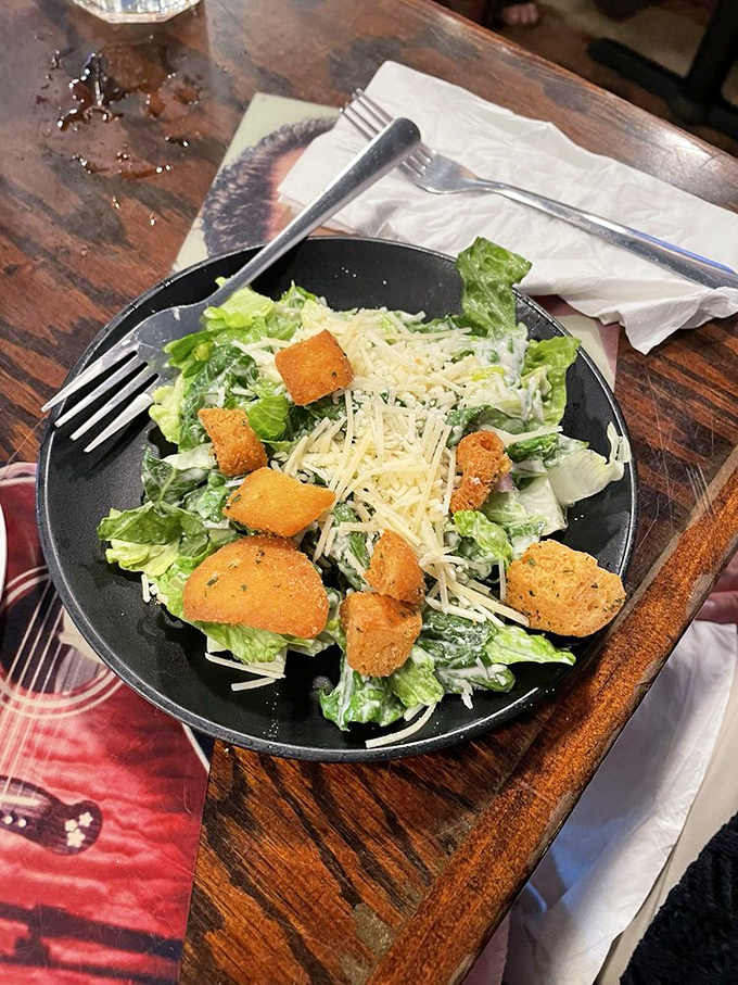 A Caesar salad that doesn't apologize for being simple&mdash;crisp romaine, golden croutons, and enough parmesan to make a Roman proud.