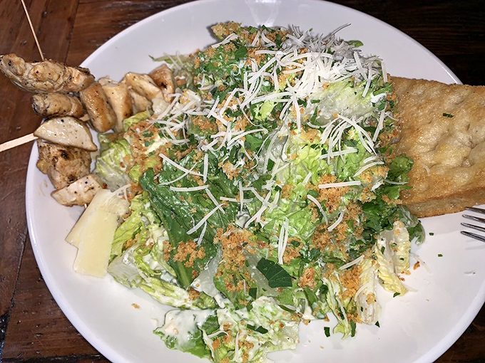 Caesar salad with a side of respect&mdash;crisp romaine, proper dressing, and a flatbread that knows its supporting role perfectly.