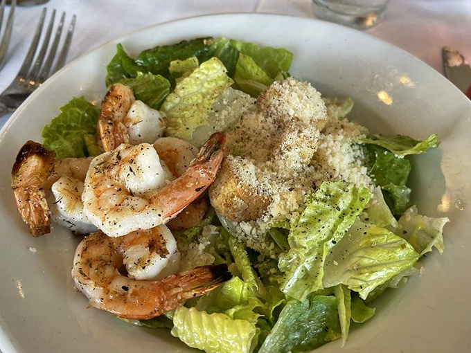 Sometimes simplicity wins &ndash; perfectly grilled shrimp perched atop crisp romaine, a Caesar salad that proves classics become classics for good reason.