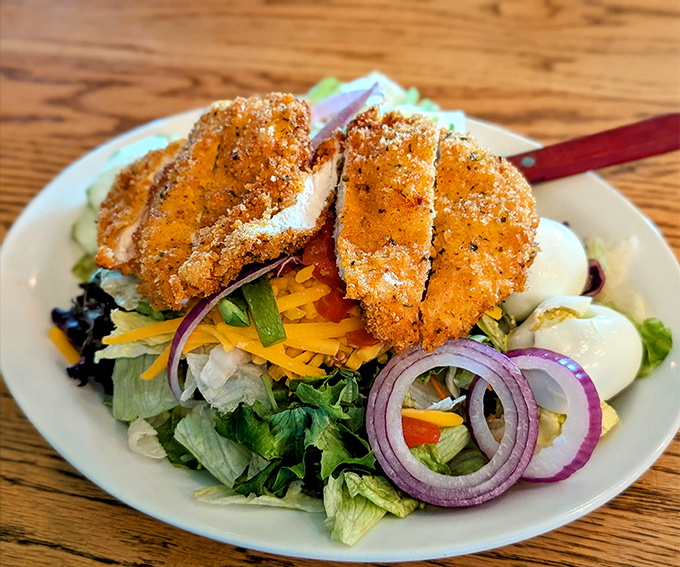 Cajun chicken salad topped with crispy golden tenders because sometimes salad needs a little Southern flair and serious crunch factor.