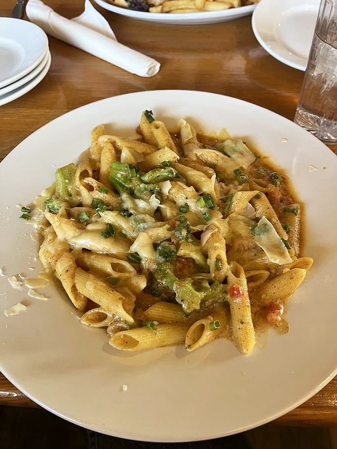 Penne pasta swimming in a sea of spicy cajun goodness. Fork-twirling has never been this exciting or rewarding.