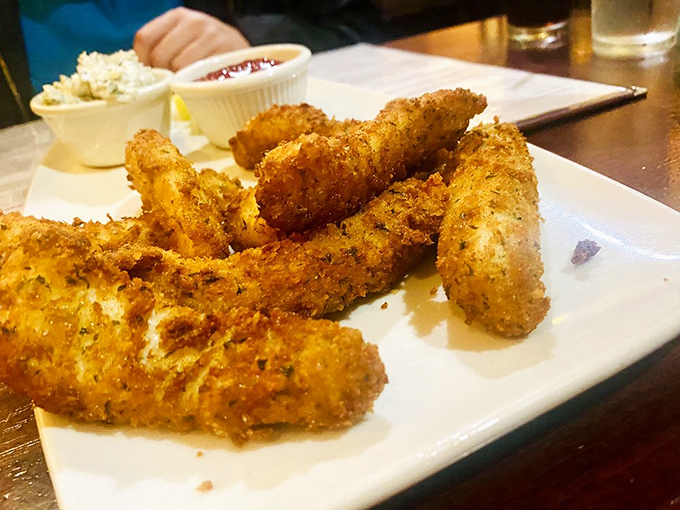 These aren't just calamari strips &ndash; they're crispy golden tickets to seafood heaven, where the crunch-to-tenderness ratio is always perfect.