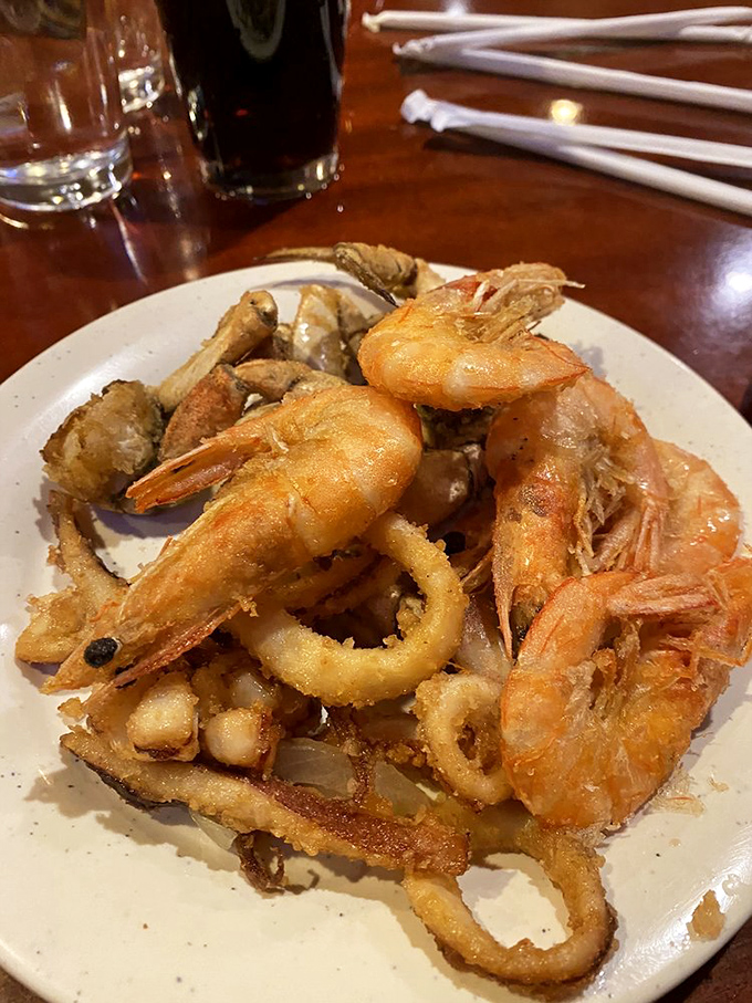 Golden fried seafood that crackles with promise - calamari and shrimp tempura that practically beg to be devoured.