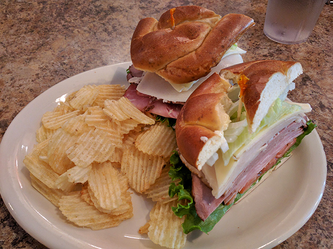 A sandwich that requires both hands and a strategy. That pretzel bun isn't just holding ingredients&mdash;it's elevating them to sandwich royalty.