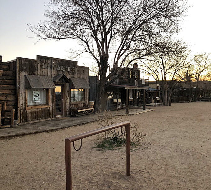 Dusk settles over Mane Street like a gentle reminder that even in the desert, the magic hour transforms ordinary wood into gold.