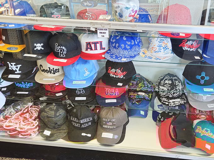 Baseball caps tell America's story through team loyalties and regional pride, displayed like colorful badges of cultural identity.