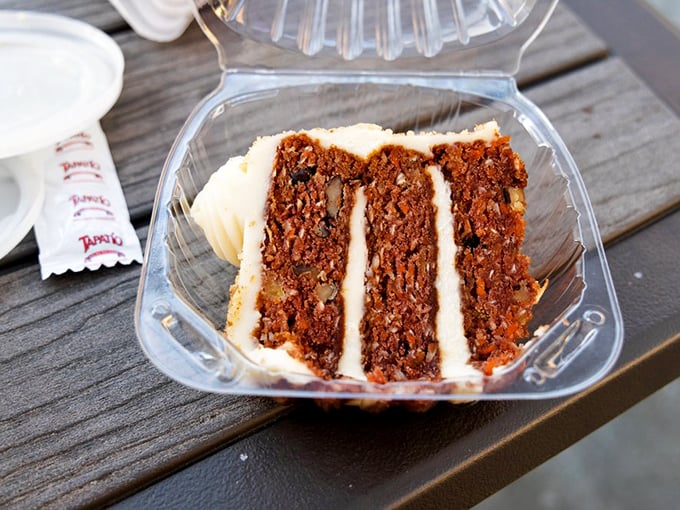 A slice of carrot cake that somehow manages to feel like both an indulgence and a well-deserved reward after your seafood feast.