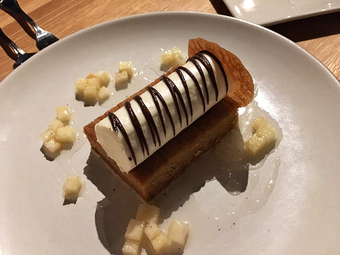 Dessert architecture that belongs in a museum. Those chocolate stripes are playing by their own delicious rules.