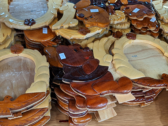 Wooden serving bowls carved with character await their next dinner party debut. Conversation pieces that actually serve a purpose beyond collecting dust.