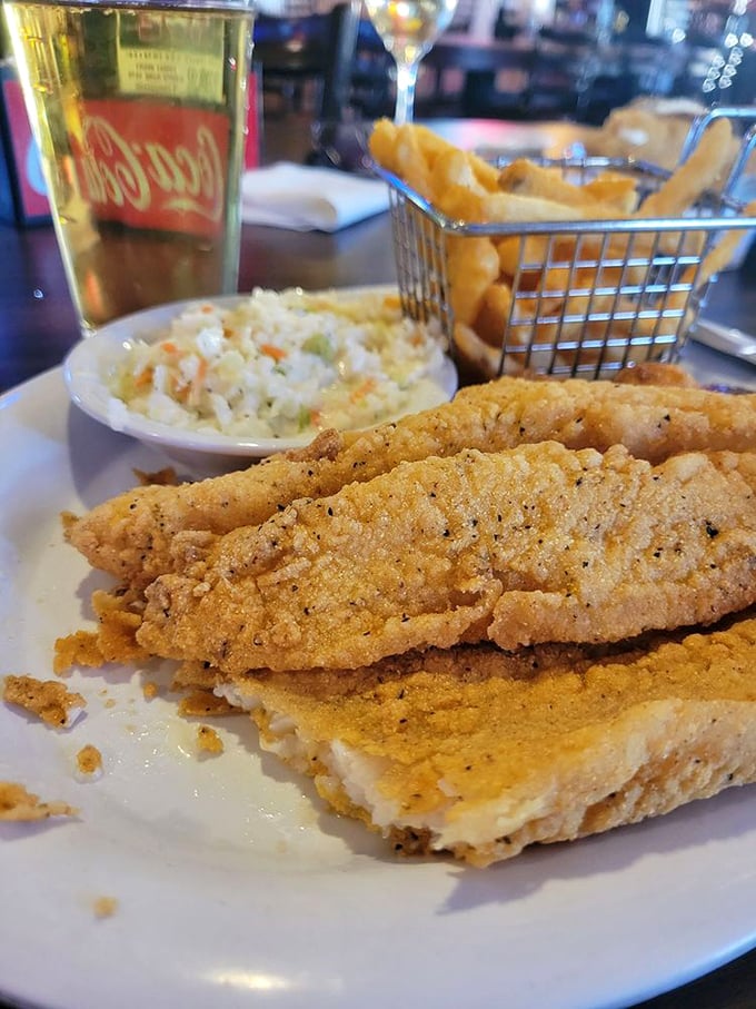 The catfish dinner comes with coleslaw and fries in a wire basket&mdash;a trio that's been making Midwesterners smile since before Netflix existed.