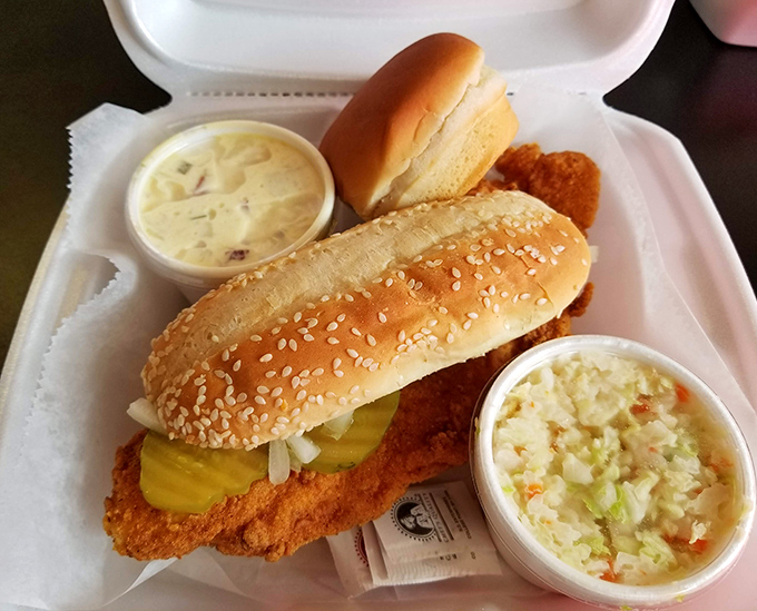 The chicken sandwich that puts fast food chains to shame. With pickles peeking out and slaw standing by, this sandwich means serious business.