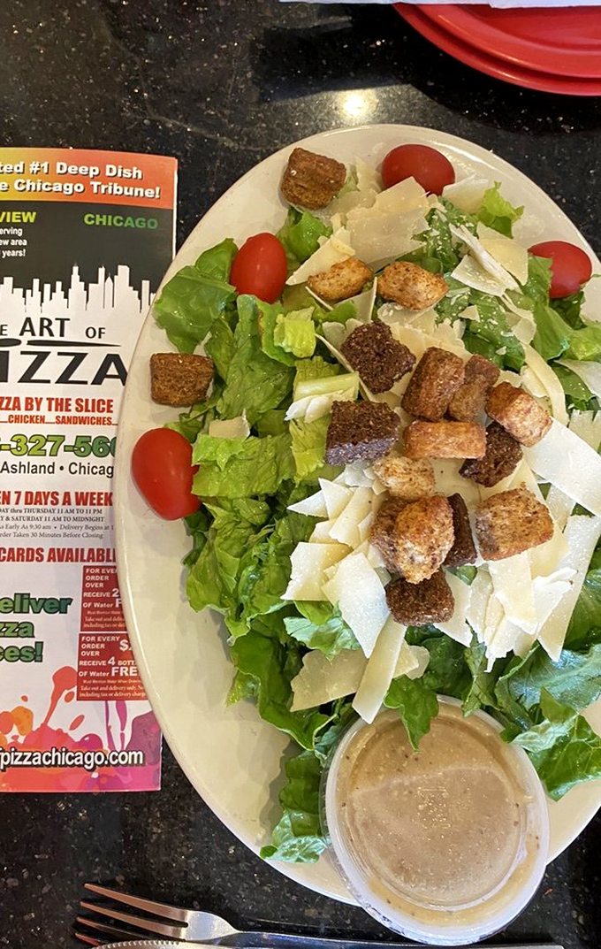 When you need something green to balance out all that pizza, their Caesar salad steps up with crisp romaine and generous shavings of parmesan.