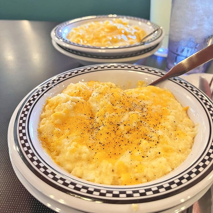 Cheese grits that achieve that perfect creamy consistency&mdash;the South's greatest breakfast contribution, executed with Maryland flair.