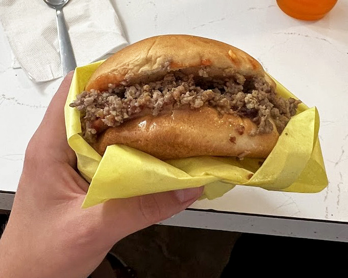 Cheese melting over loose meat like a delicious avalanche, proving that simplicity executed perfectly beats complexity every single time.