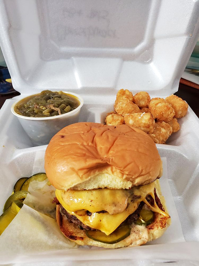 This isn't just a cheeseburger&mdash;it's architecture. The pickles and tater tots aren't sides; they're supporting actors in this delicious drama. 