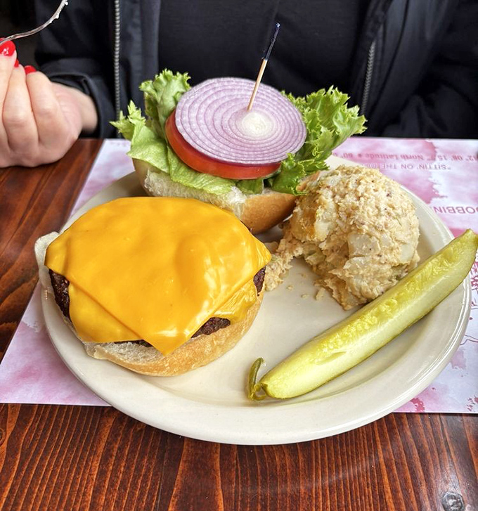 Even in seafood paradise, sometimes you just need a perfectly melted cheeseburger with all the fixings and zero regrets.