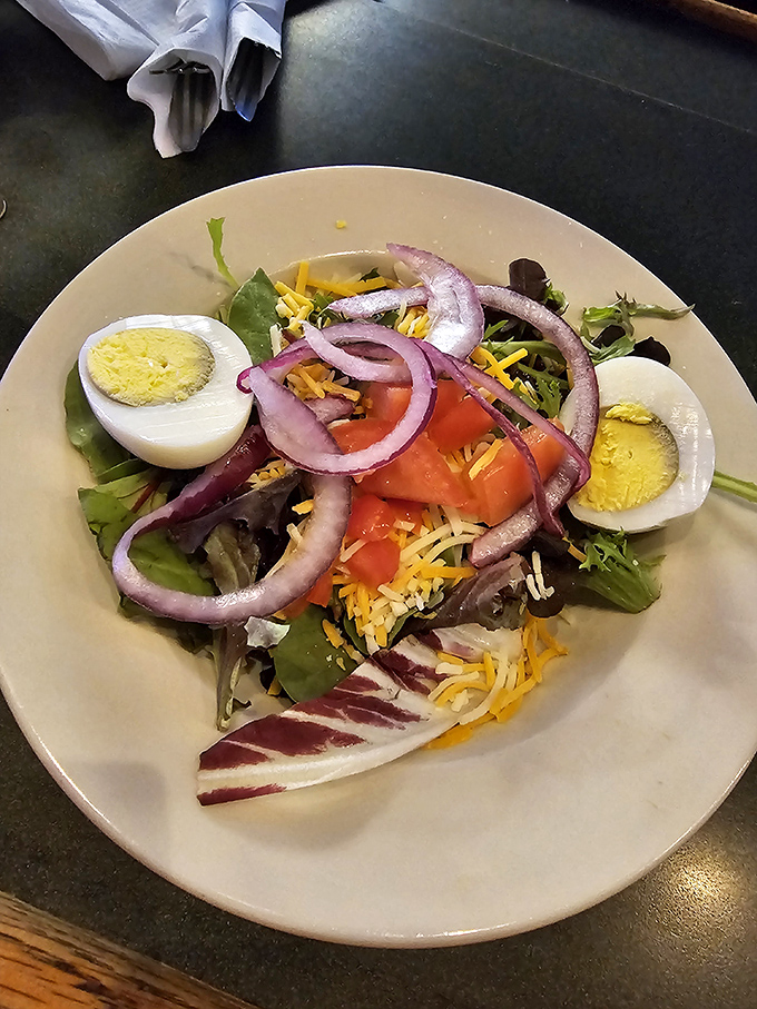 A salad that actually looks like it's trying&mdash;fresh ingredients arranged with care rather than tossed from across the kitchen with indifference.