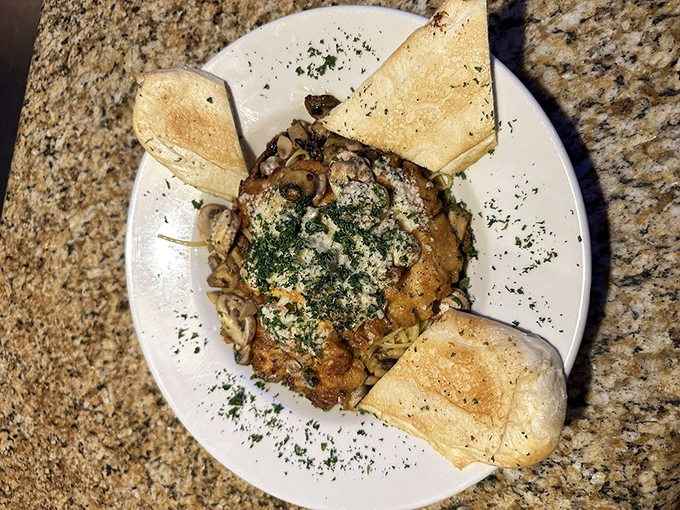 Mediterranean magic meets Florida comfort food. This chicken dish with toasted pita points is what happens when simple ingredients get the royal treatment.