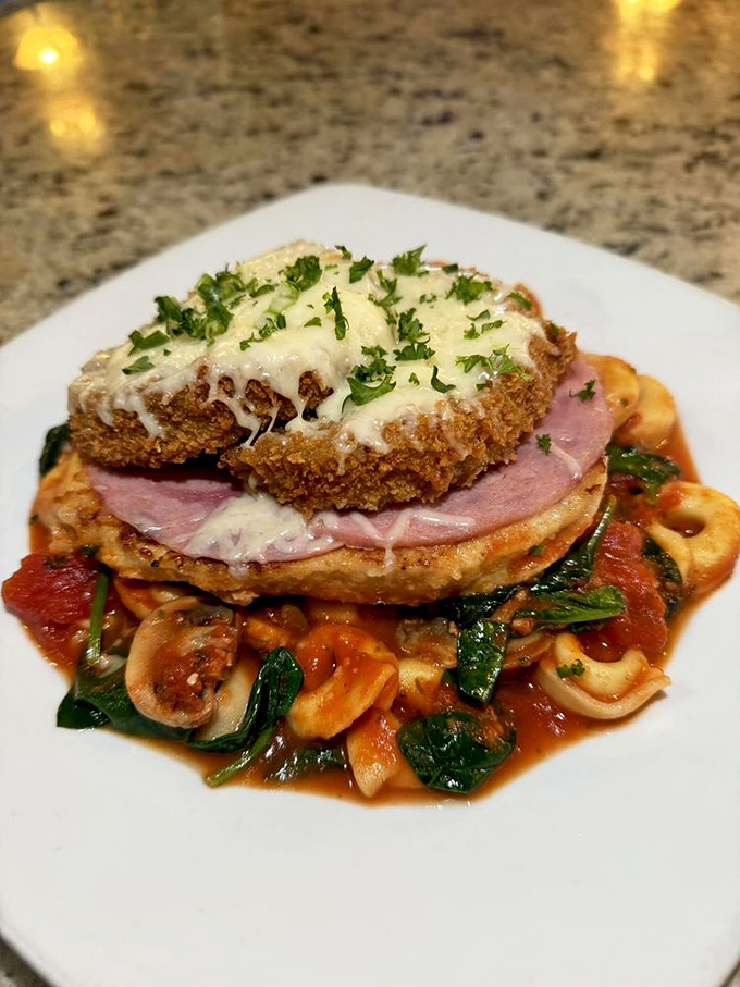 This towering creation isn't just dinner, it's architecture—layers of flavor stacked with the precision of a culinary Jenga master.