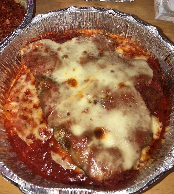 Chicken parmigiana that makes you understand why people write songs about food. That golden cheese blanket is tucking in some serious flavor.