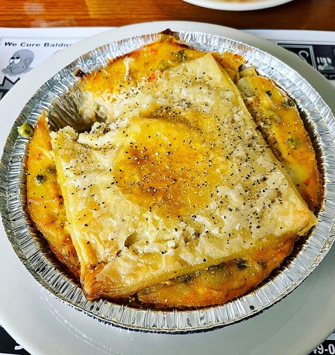 Chicken pot pie that doesn't know it's 2023 &ndash; gloriously old-school comfort under a golden pastry roof.