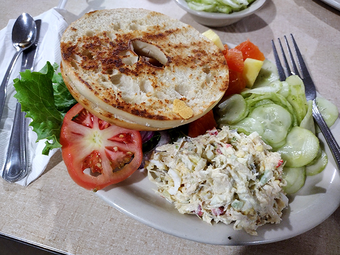 A proper bagel with chicken salad and fresh vegetables&mdash;proof that sometimes lunch should be both virtuous and delicious without sacrificing either.