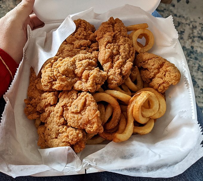 Golden chicken tenders with fries &ndash; proof that sometimes the simple things done right are absolutely perfect.