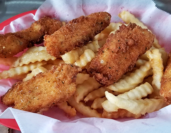 Crispy chicken tenders nestled among crinkle-cut fries &ndash; a combo that's kept kids and grown-ups happy since time immemorial.