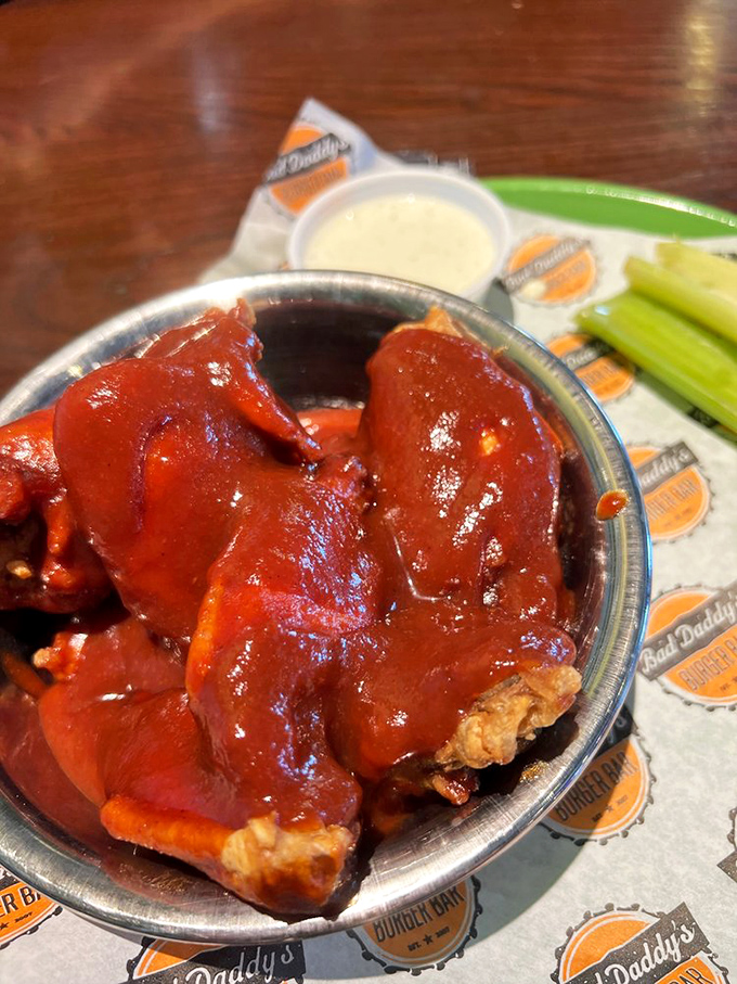 These wings aren't just swimming in sauce&mdash;they're doing the backstroke in a pool of flavor that demands both napkins and respect.