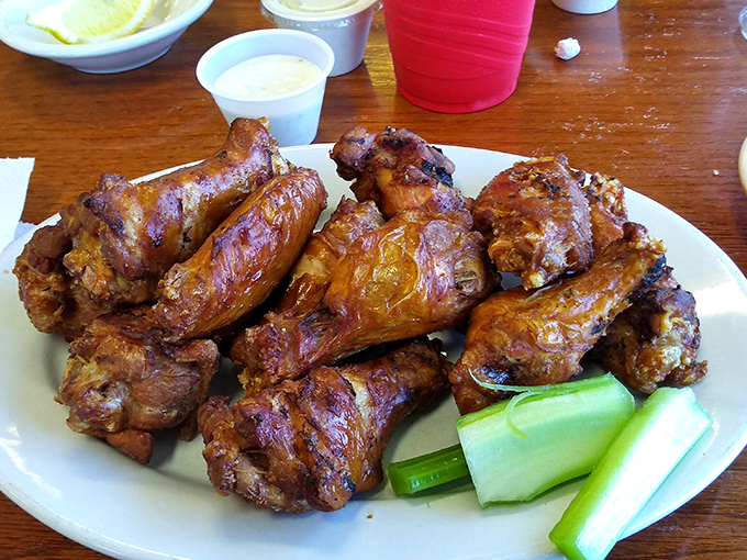 Wings with attitude&mdash;crispy, saucy, and arranged like they're posing for their album cover. The celery is just there for moral support.