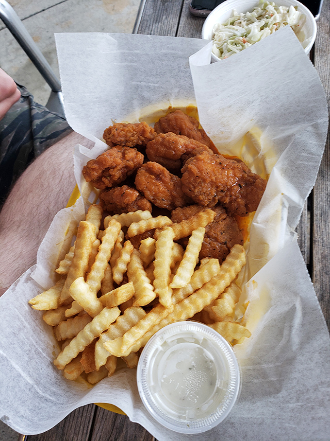 Crispy chicken tenders and crinkle-cut fries—proof that sometimes the simplest pleasures are the most satisfying. Just add coleslaw.