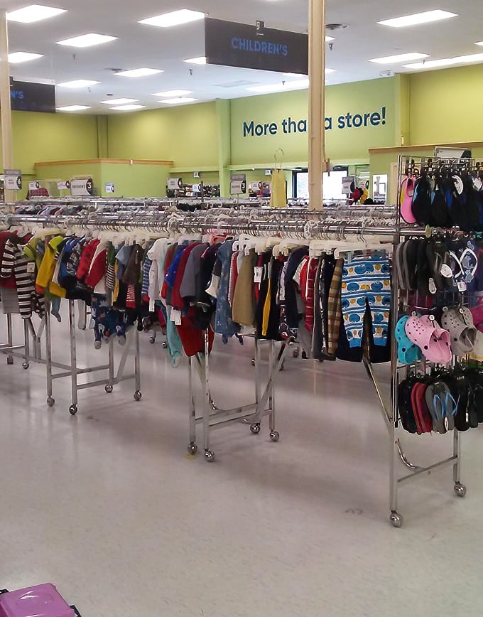The children's section: where parents discover the fiscal wisdom of buying clothes that will be outgrown, stained, or declared "totally uncool" within three months.