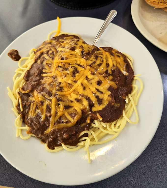 Spaghetti with meat sauce and melted cheese&mdash;where Italian-American diner fusion creates the comfort food equivalent of a warm hug.