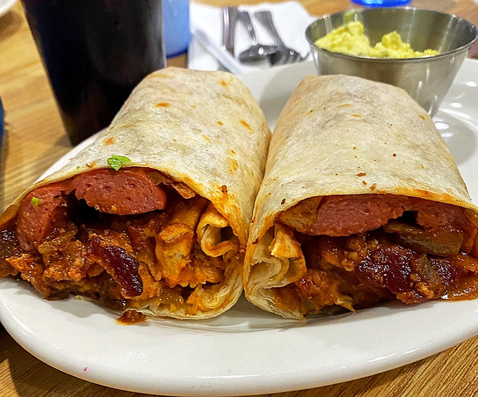 Breakfast burritos that could feed a small nation, packed with savory goodness and wrapped in tortillas that somehow maintain their structural integrity against all odds.