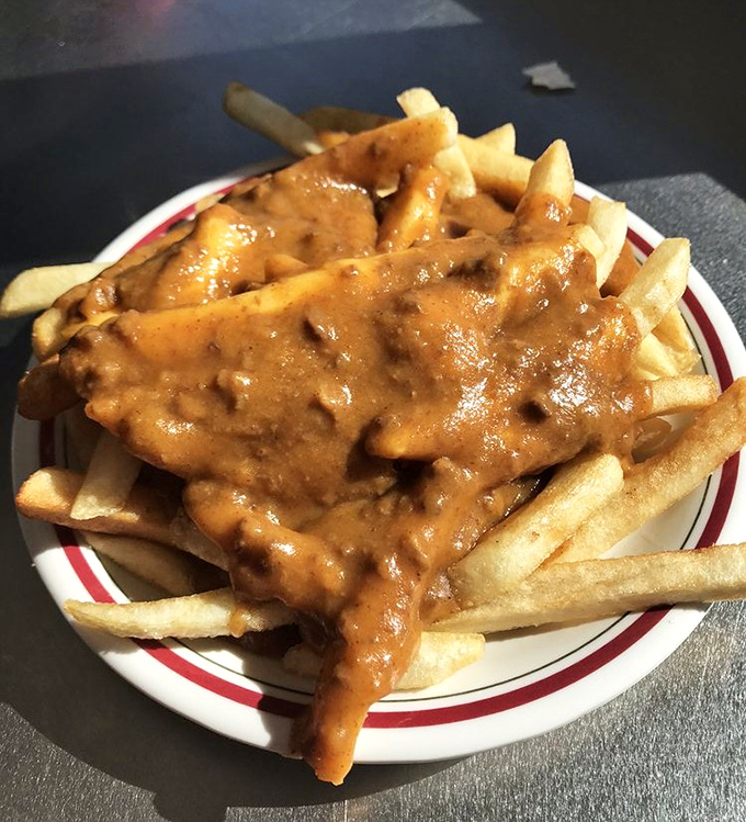 Chili cheese fries that don't mess around&mdash;a plate of golden potatoes smothered in savory chili that's worth every napkin you'll need afterward.